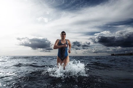 Woman Entering Open Water